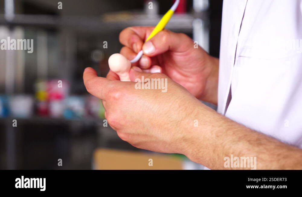 pastry chef makes lace and for the wedding cake Stock Video Footage - Alamy