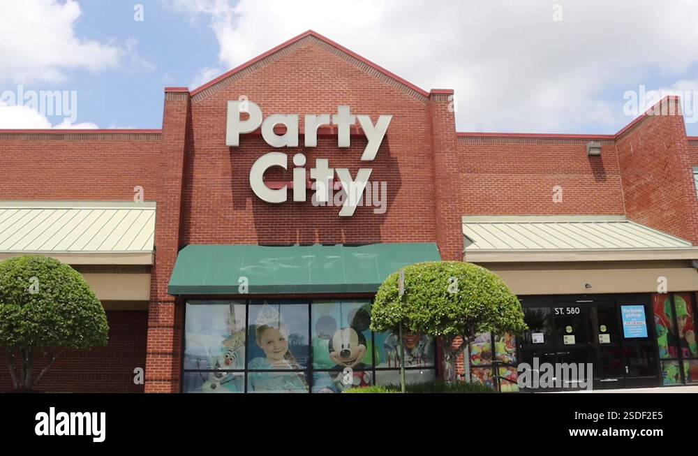 Party city retail store front view reflections in window on Pleasant ...