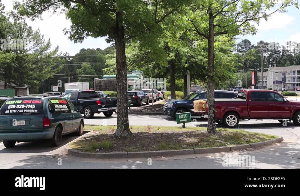 Krispy Kreme donut restaurant long lines in drive thru on Stone ...