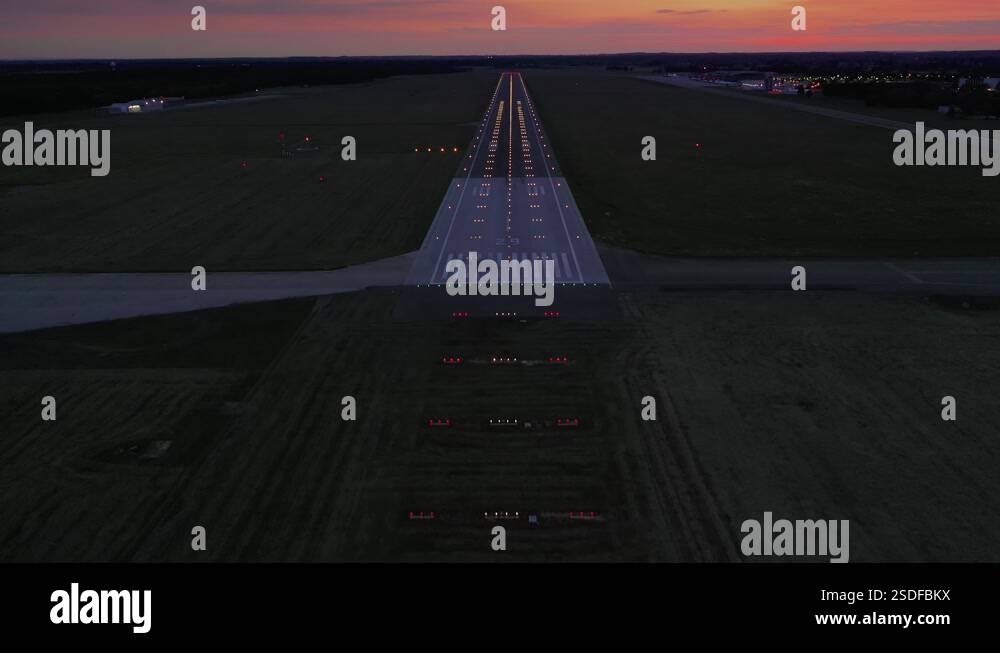 Empty airport runaway with braking and marks, aproach 29 and all lights ...