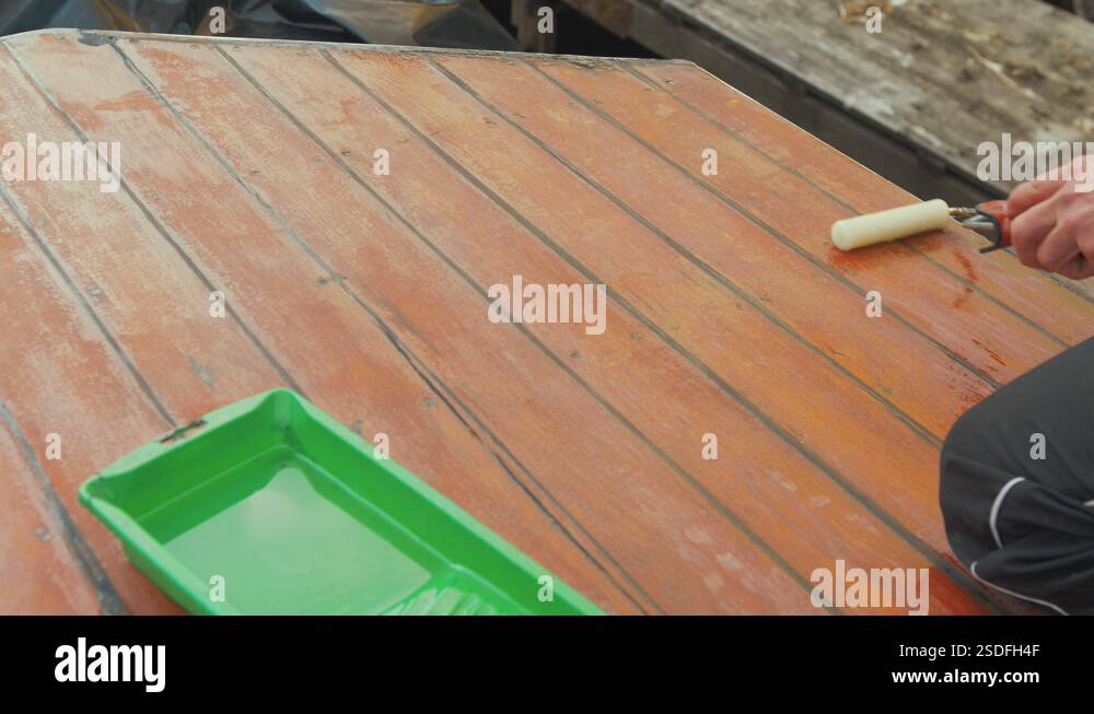 Rolling varnish roof planks of wooden boat wheelhouse cabin Stock Video ...