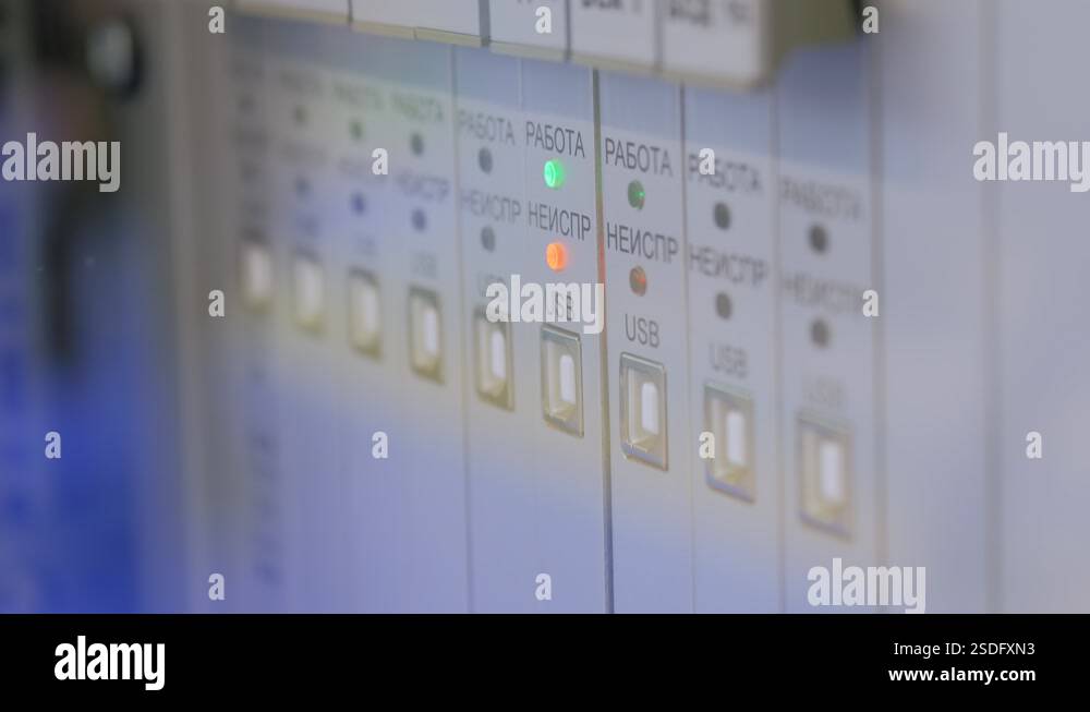 Lighting status indicator signals on electric control panel of machine ...