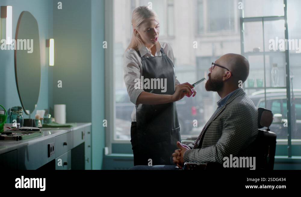 Beautiful Hair Stylist Explains to the Customer What Shape of the Beard ...