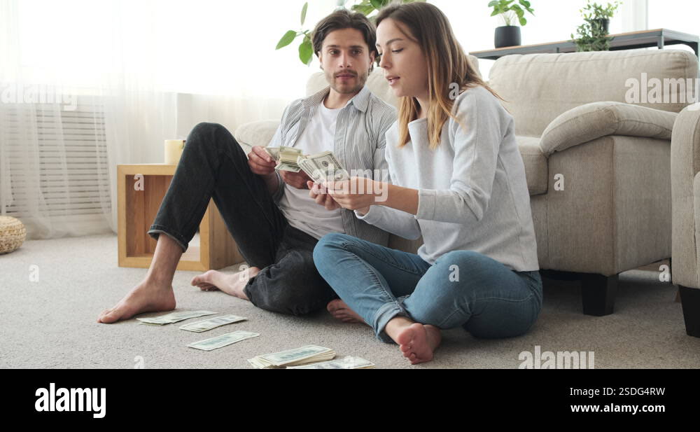 Couple counting money banknotes and planning for future Stock Video ...