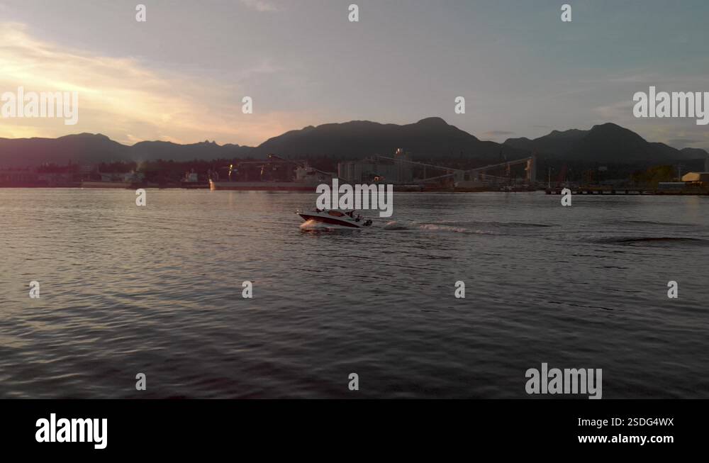 A small pleasure craft in Vancouver harbor at sunset. 24FPS 4K Stock ...