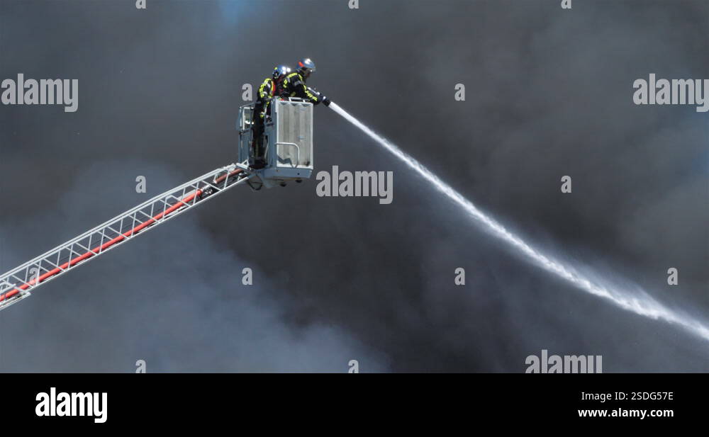 Black smoke over a factory burning, Aigues Mortes, Occitanie, France ...