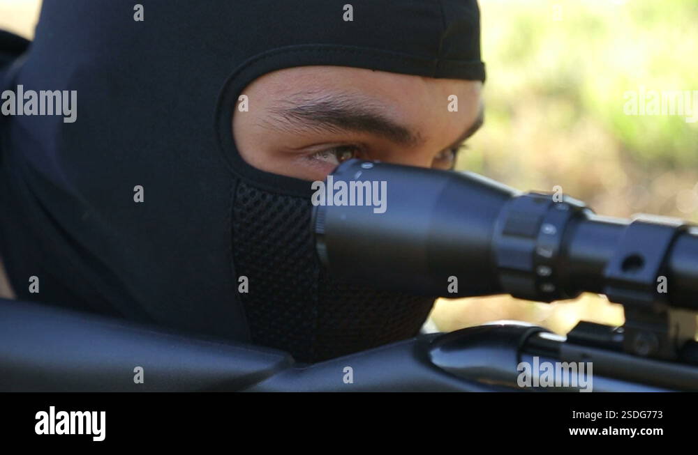 Masked sniper takes aim and shoots - Slow Motion Stock Video Footage ...