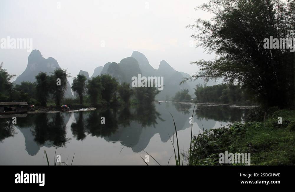 China, yangshuo, yulong river and karst landscape, right to left pan ...
