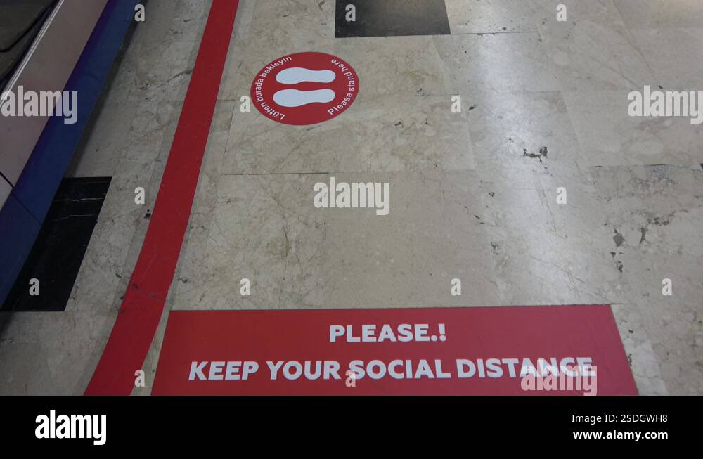 Viewing distance marking on the floor of the baggage dispensing point ...