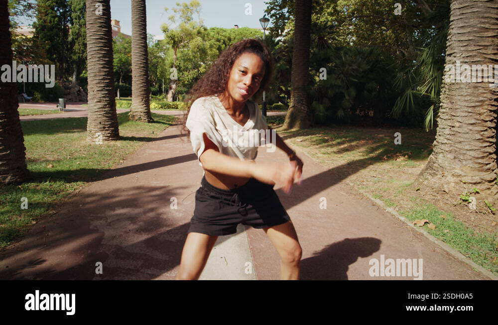 Black woman dancer in park, african american woman dancing hip-hop ...
