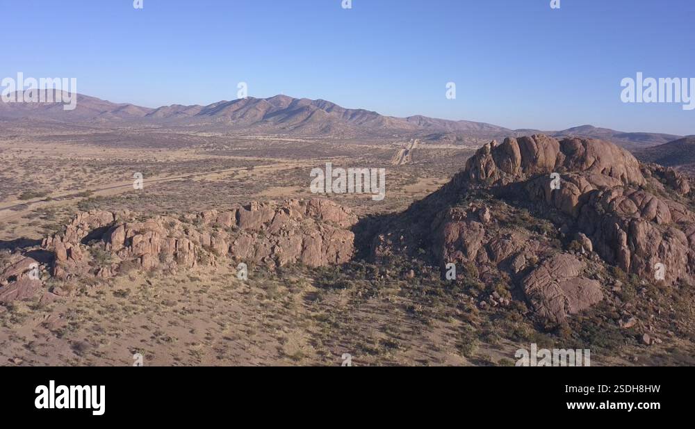 4K aerial video of granite boulders range in savanna in Namibia Stock ...