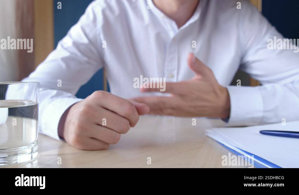 Angry boss swears, gestures and hits the table with his fist Stock ...