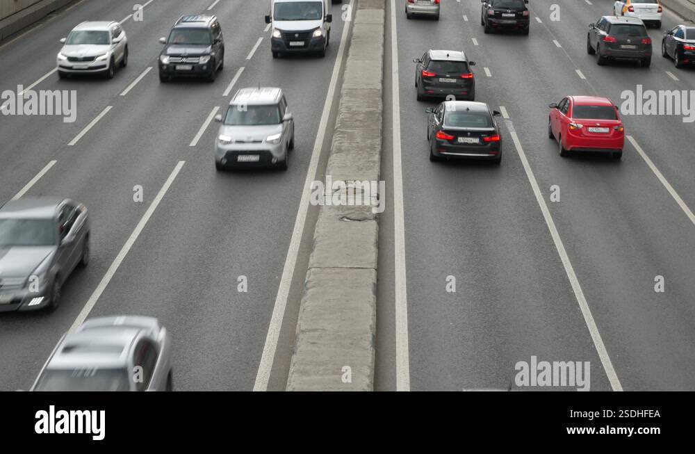 Cars drive in dense stream along Garden Ring in capital city. Tunnel at ...
