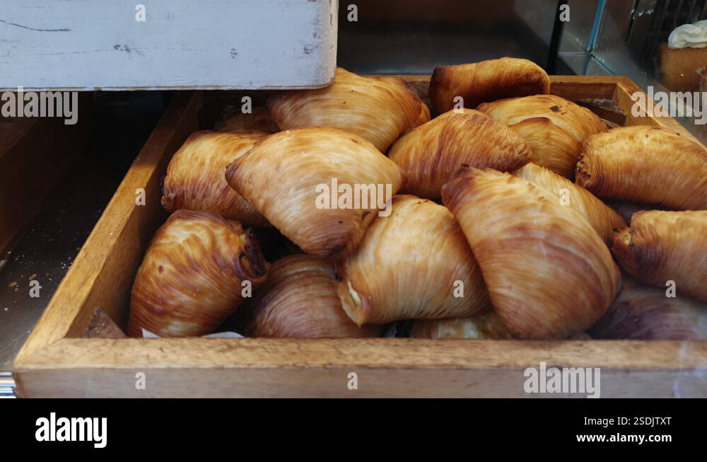 4K PAN of sfogliatella riccia a neapolitan traditional pastry in Naples ...