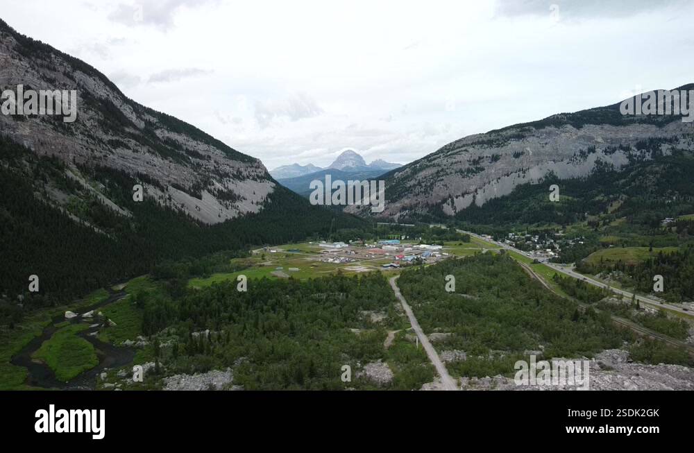 Aerial of Frank, Alberta and Crowsnest mountain in the Crowsnest Pass ...