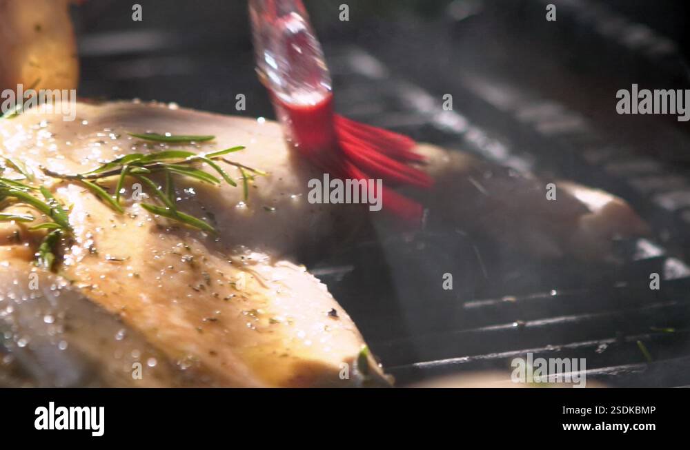 Slow motion of chef cooking barbecue with a whole pig on grilled. BBQ ...