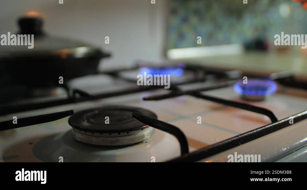Hand ignite the gas burners Stock Video Footage - Alamy