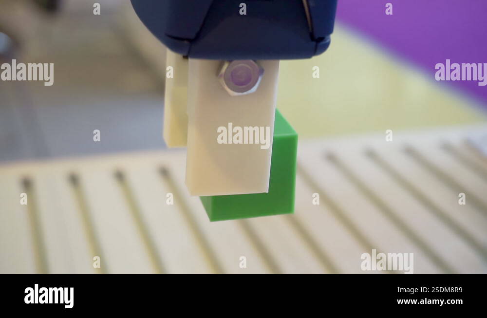 mechanical arm. manipulator industrial robot gently moves the small ...