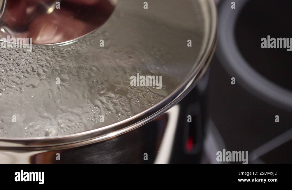 Water Boiling In Saucepan, Bubbles From Boiling Water. Cooking Pot Full ...