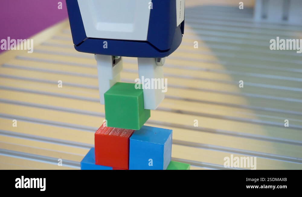 mechanical arm. manipulator industrial robot gently moves the small ...