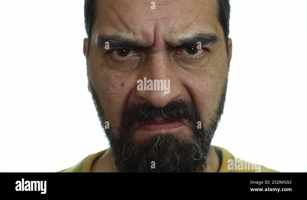 Close up, a man with angry face on a white background Stock Video ...