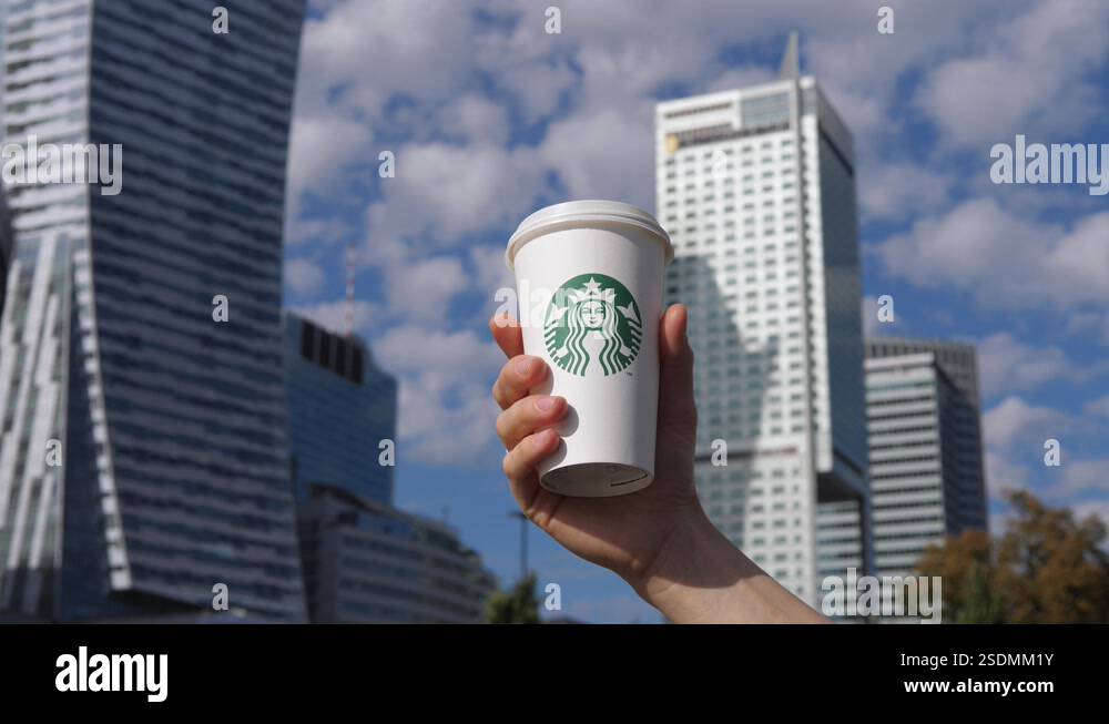 Hand holding starbucks coffee takeaway cup Stock Videos & Footage - HD ...