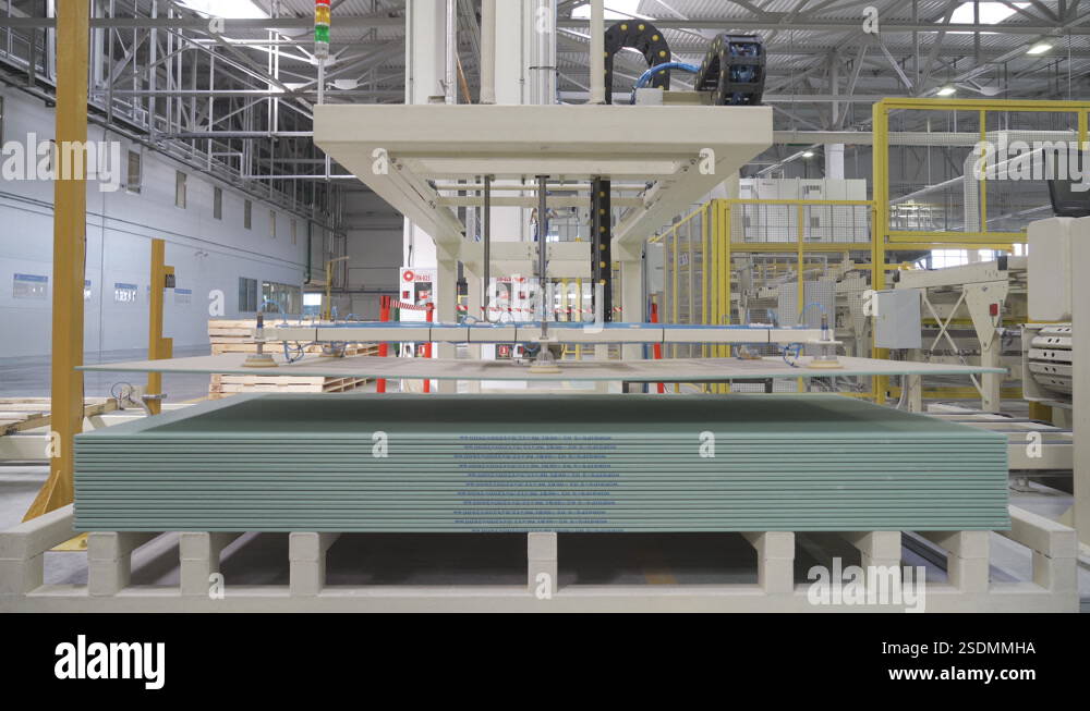 Gypsum board conveyor. Plasterboard plant. Factory or workshop ...
