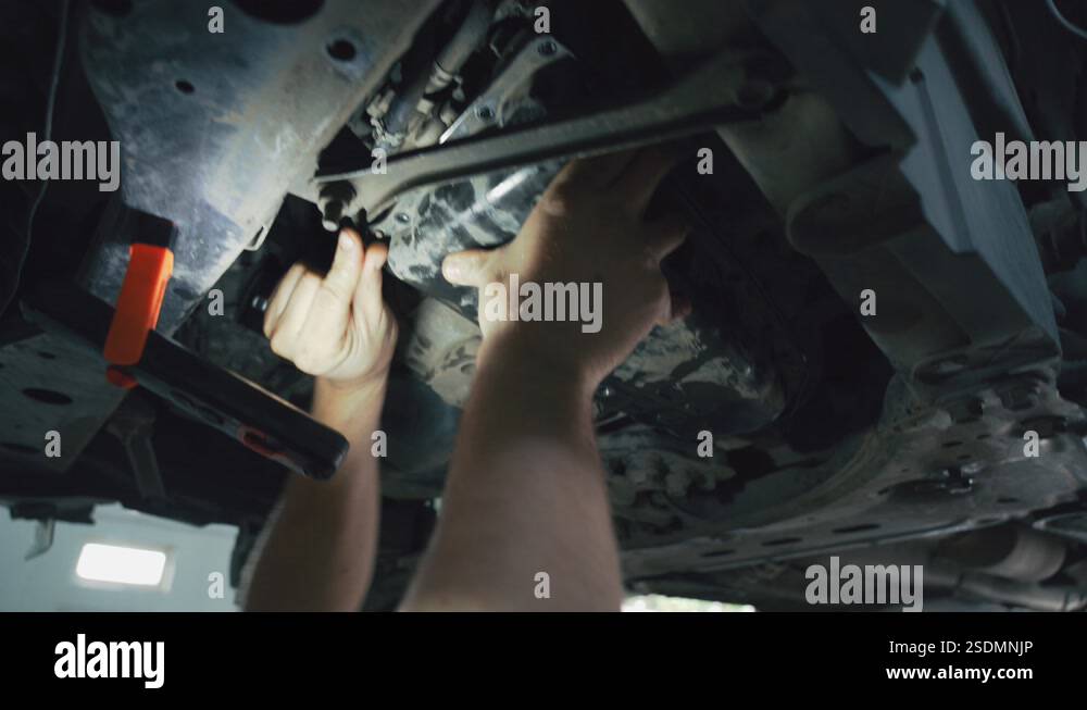 CVT gearbox changing oil in modern automatic transmission on SUV in Car ...