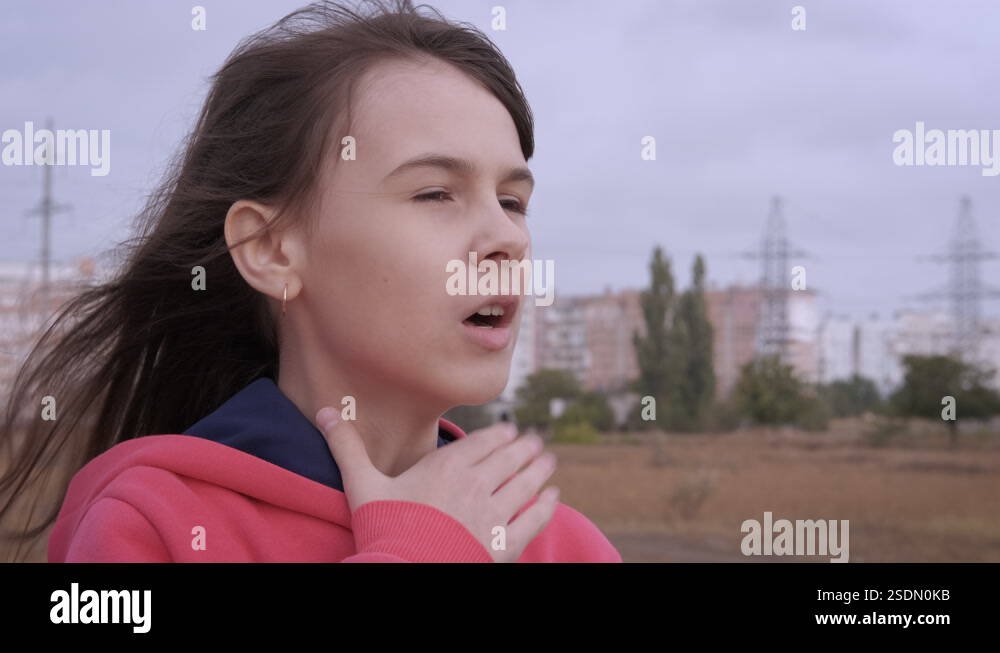 The girl is choking with asthma Stock Video Footage - Alamy