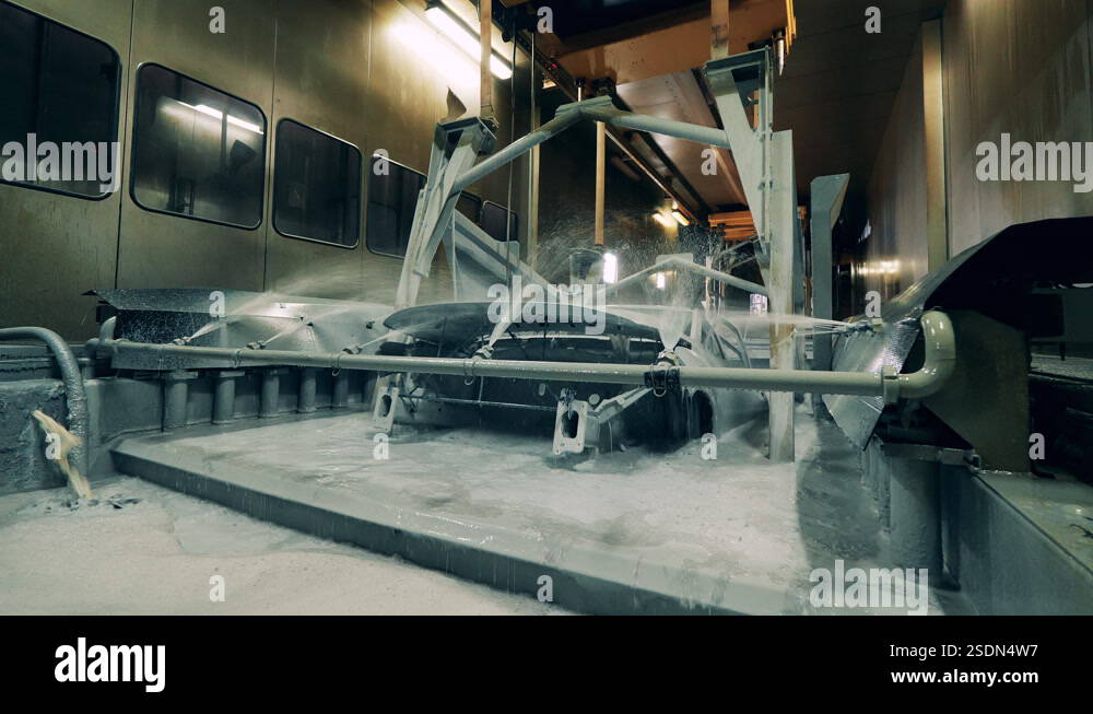 Car carcass is getting taken out of the pool with zinc solution Stock ...