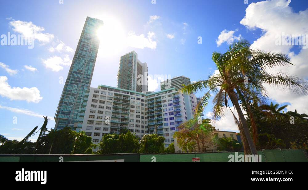 Bright sun backlit city scene with highrise towers motion 4k Stock ...