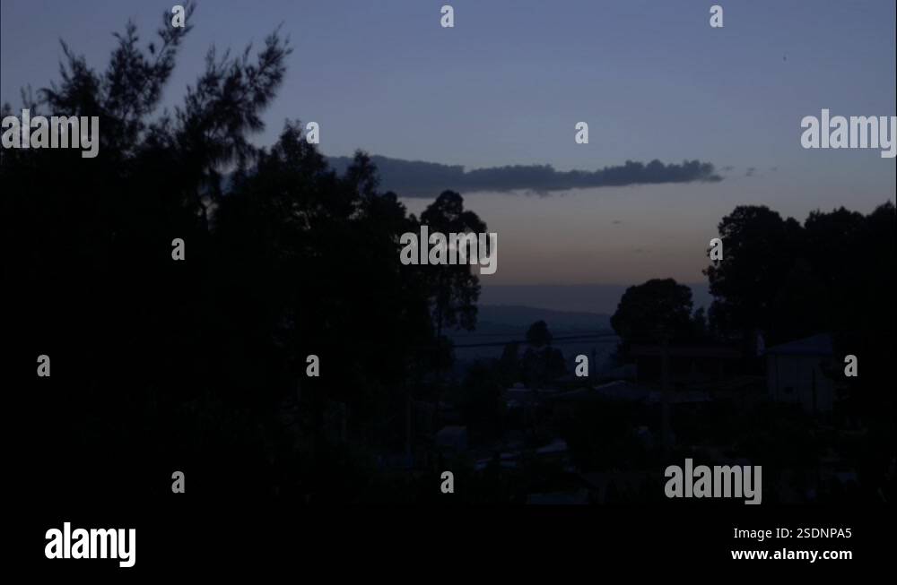 Sunset in Addis Ababa Ethiopia, the sun is sinking behind the hills ...