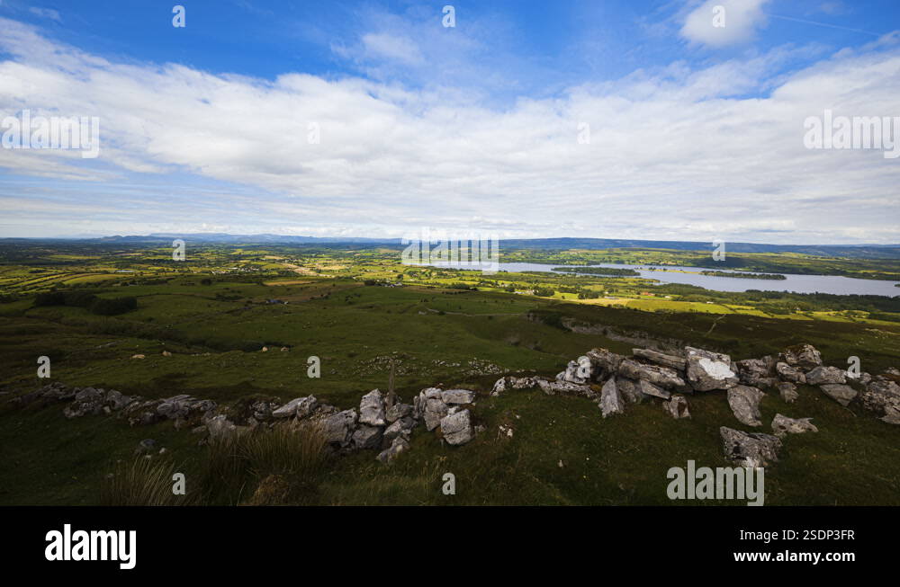 Time lapse of rural and remote landscape of grass, trees and rocks ...