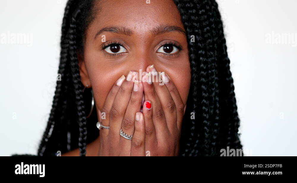 African girl surprise reaction, black teen young woman close-up face ...