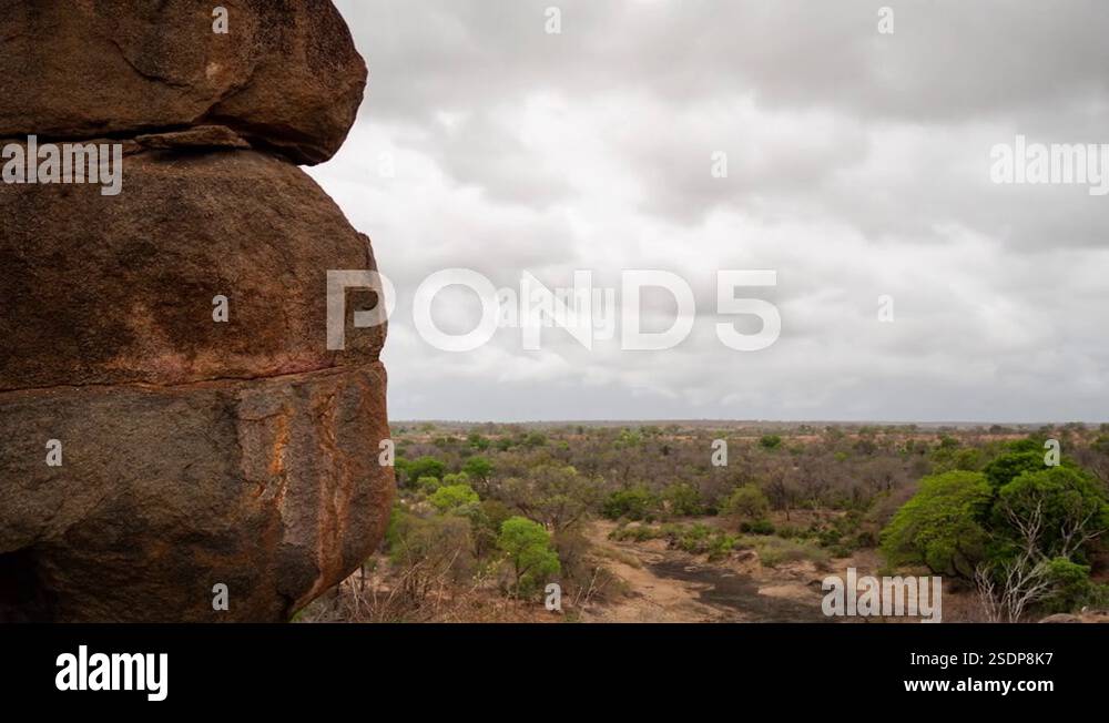 Slow linear timelapse of big granite rock boulders on overcast early ...