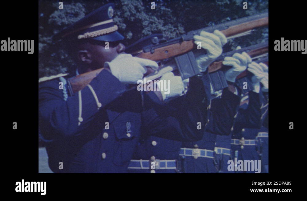 1960s: Army soldiers fire three-volley salute at military funeral ...