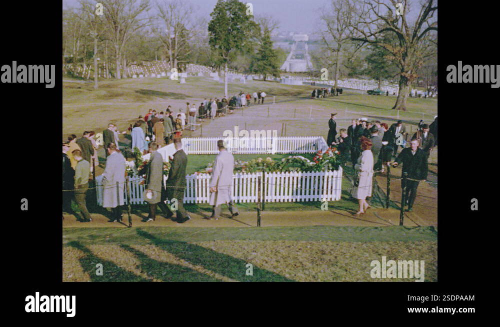 1960s: People walk by grave of John F. Kennedy in Arlington cemetery ...