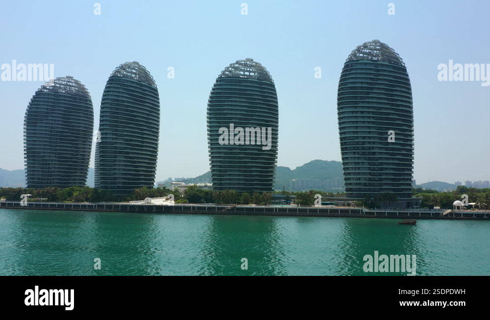 sunny hainan island sanya famous hotel complex aerial panorama 4k china ...