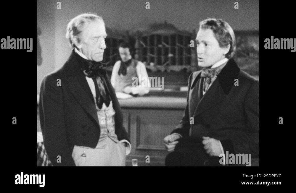 1950s: Men stand around table in coffee house and speak Stock Video ...