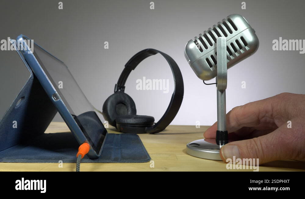 Switching on microphone next to tablet and headphones Stock Video ...