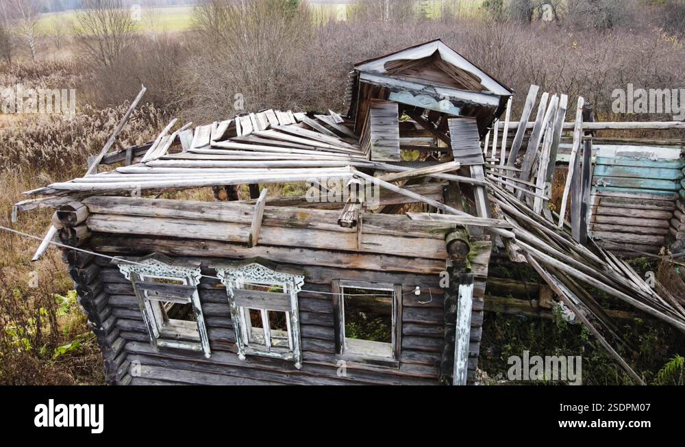 Flight forward over a collapsed building with a rotten roof Stock Video ...