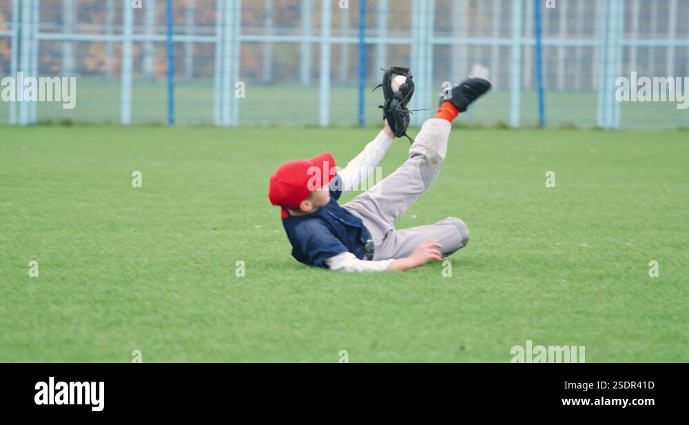 Baseball tournament at school, the boy pitcher run and successfully ...