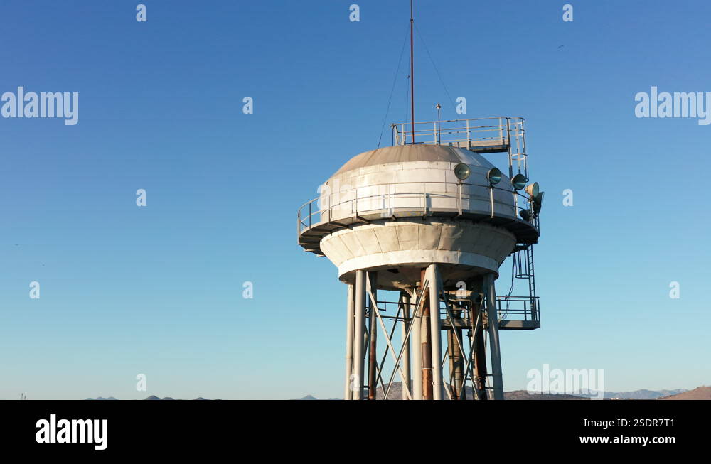 Water tower - elevated liquid storage tank. Metal reservoir for ...