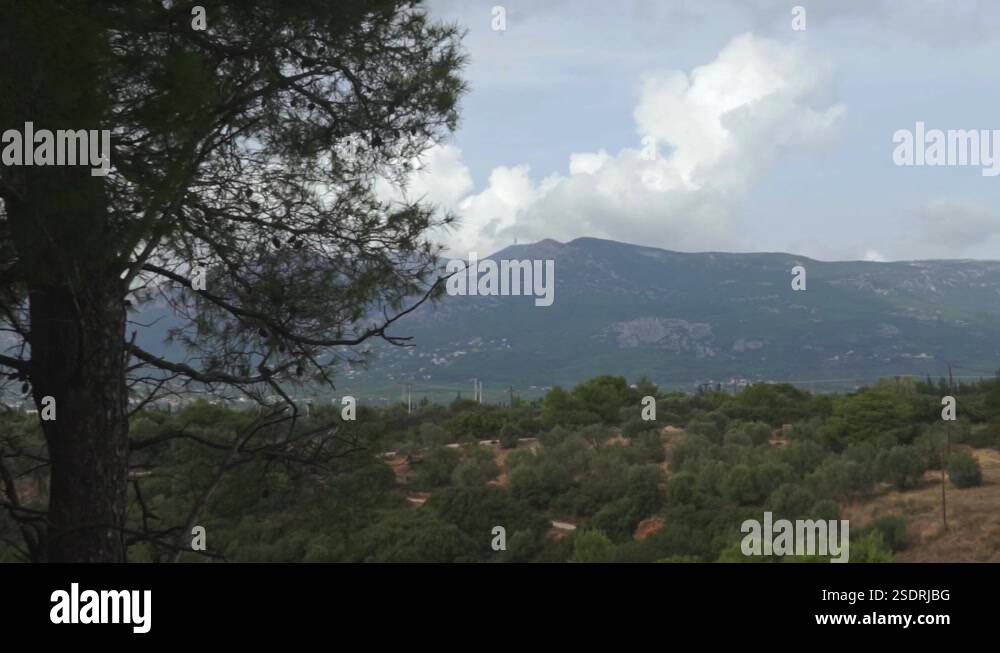 Fast pan panoramic footage of Parnitha mountain , Athens , Greece, on a ...