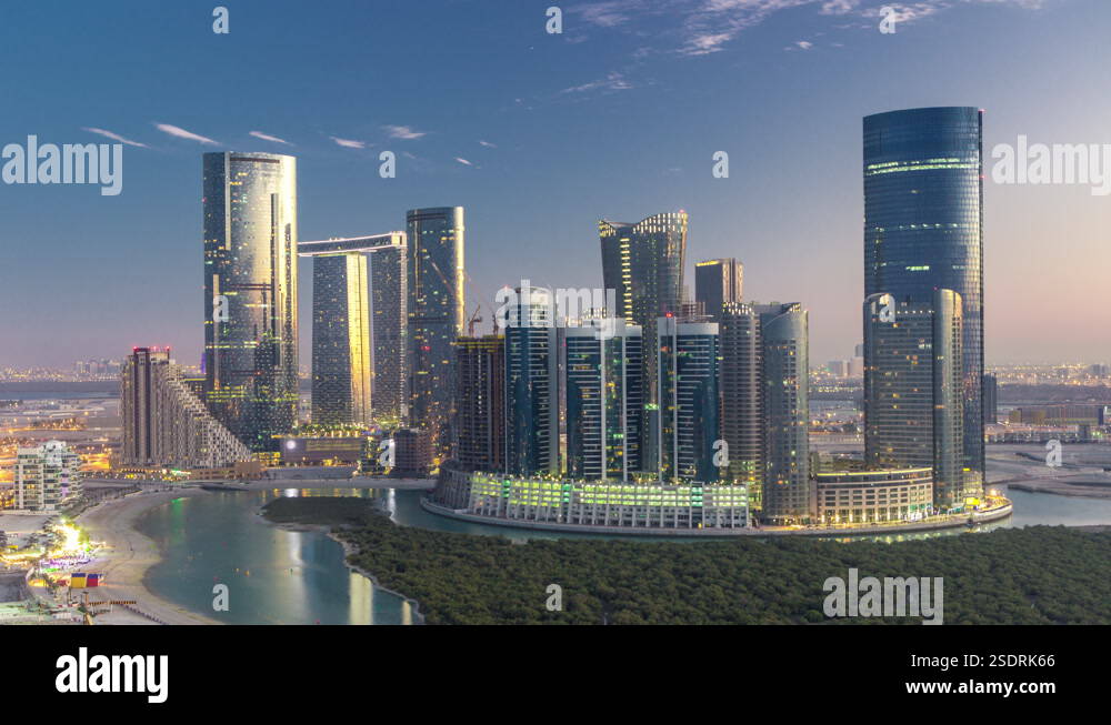 Buildings on Al Reem island in Abu Dhabi day to night timelapse from ...