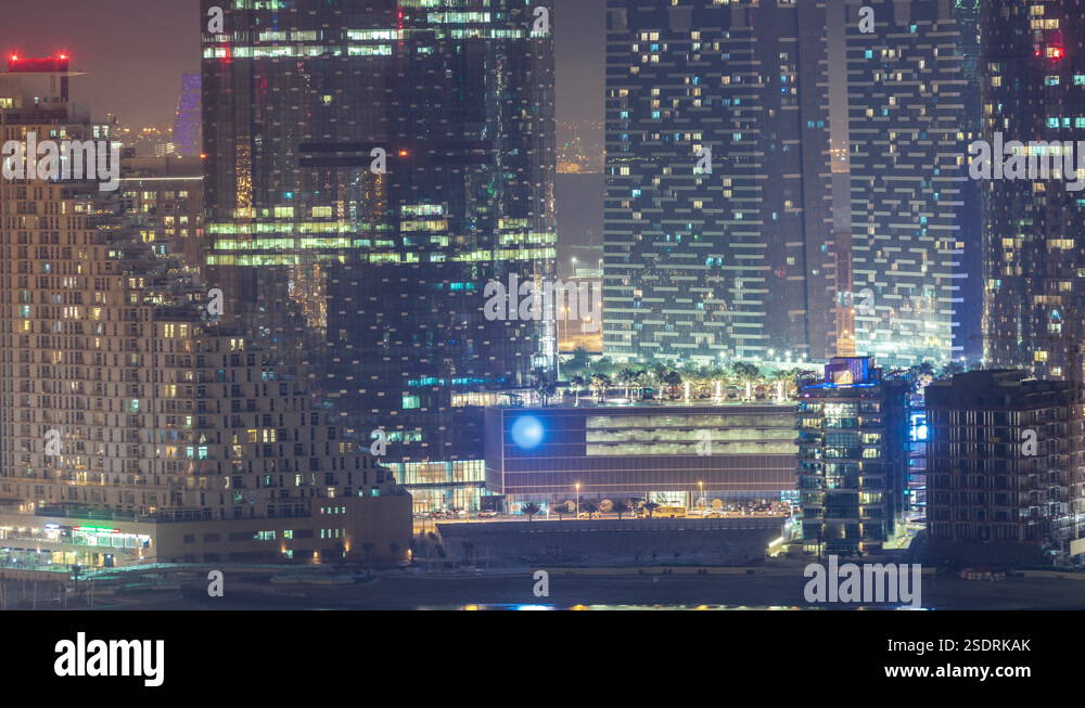 Buildings on Al Reem island in Abu Dhabi night timelapse from above ...