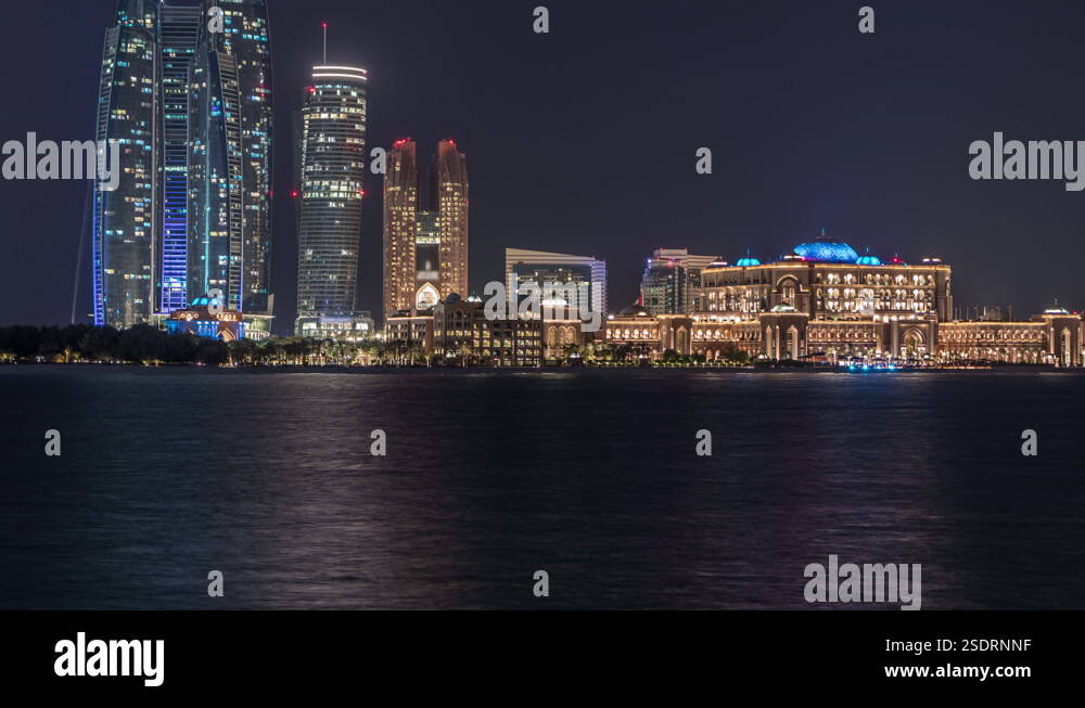 Skyscrapers of Abu Dhabi at night with Etihad Towers buildings ...