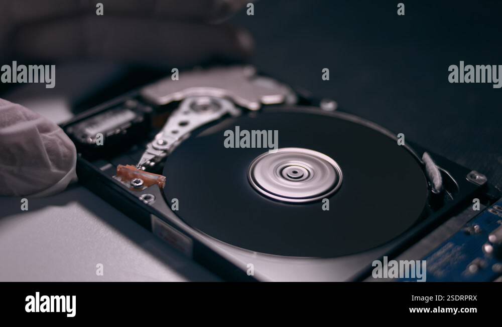 Macro close up of working opened hdd drive hard disk, move of writing ...