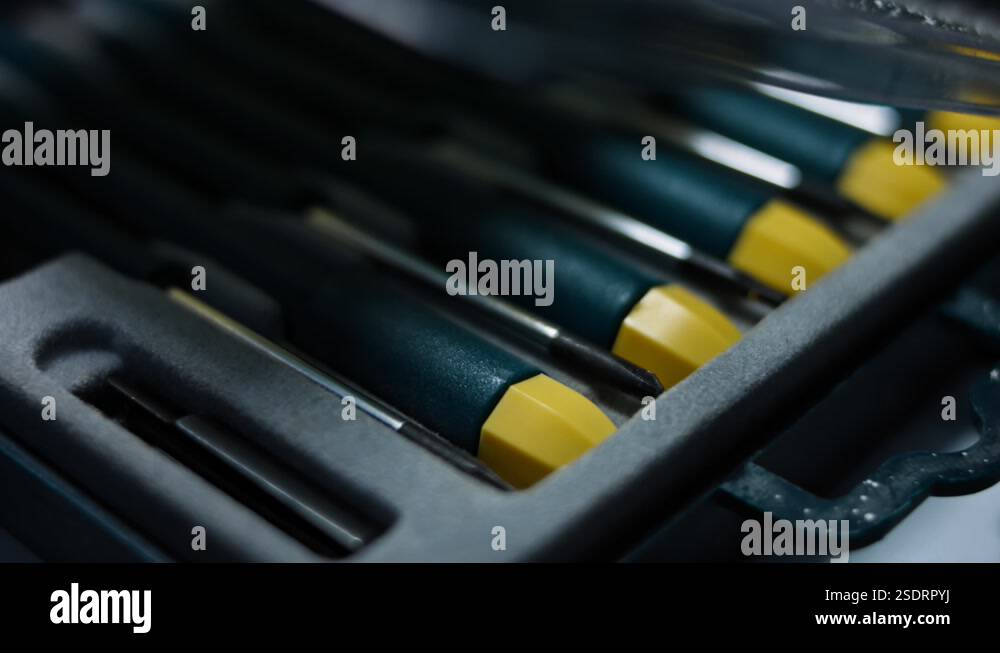Mans hand assembling screwdriver set Stock Video Footage - Alamy