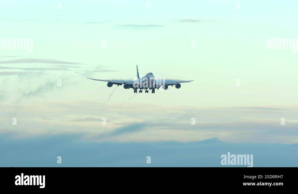 huge airplane 747 distant huge wing condensation vortex evening sky ...